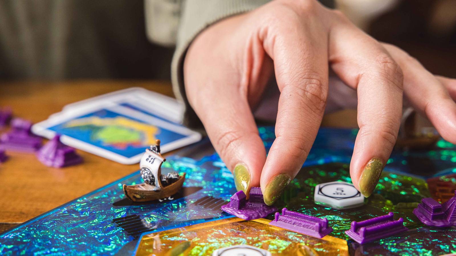 Upgrade your Catan with metal and wooden pieces with this Kickstarter