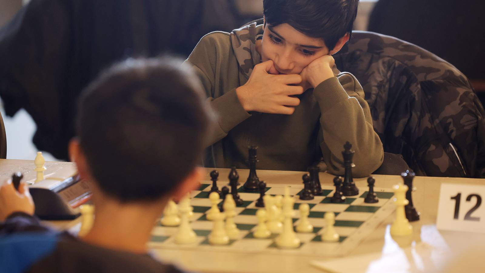 teens playing chess