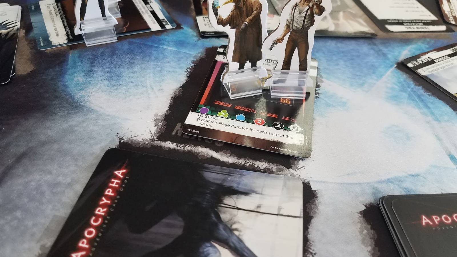 Apocrypha is a card game and tabletop RPG in one box (correction)