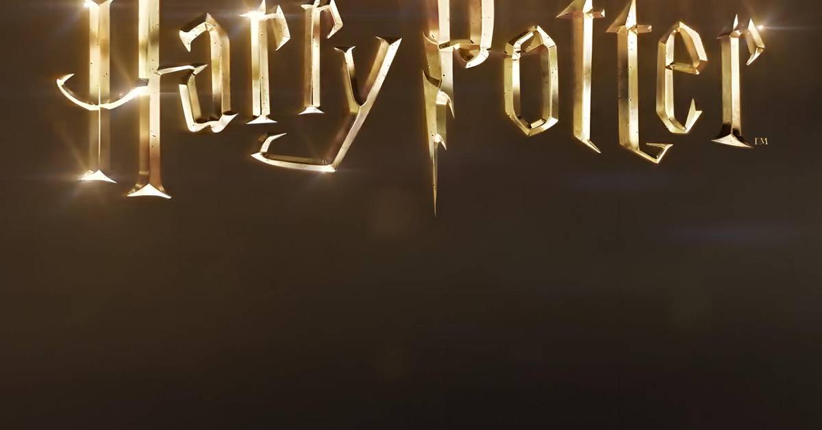 The Harry Potter Logo Is Shown In Gold